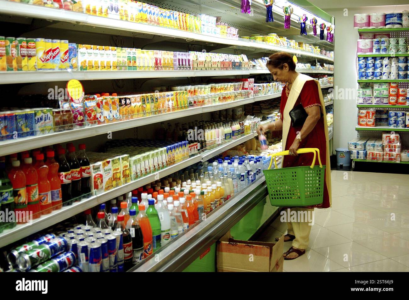 Woman buying products in Shopping Mall at Poona now Pune, Maharashtra ...