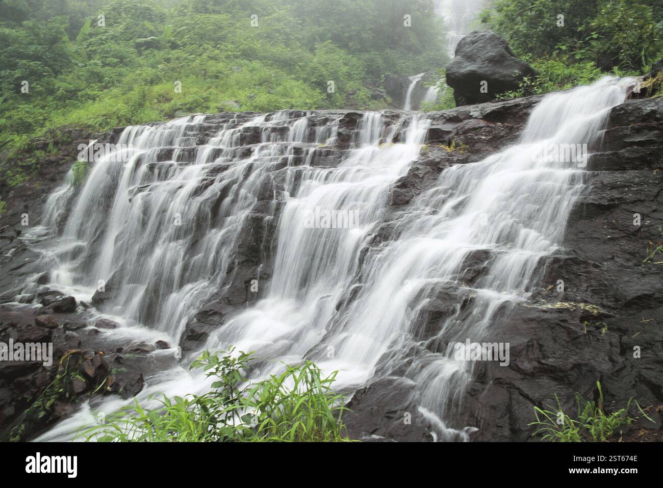 Movement blur of water at Malshej ghat waterfall near Bombay Mumbai ...