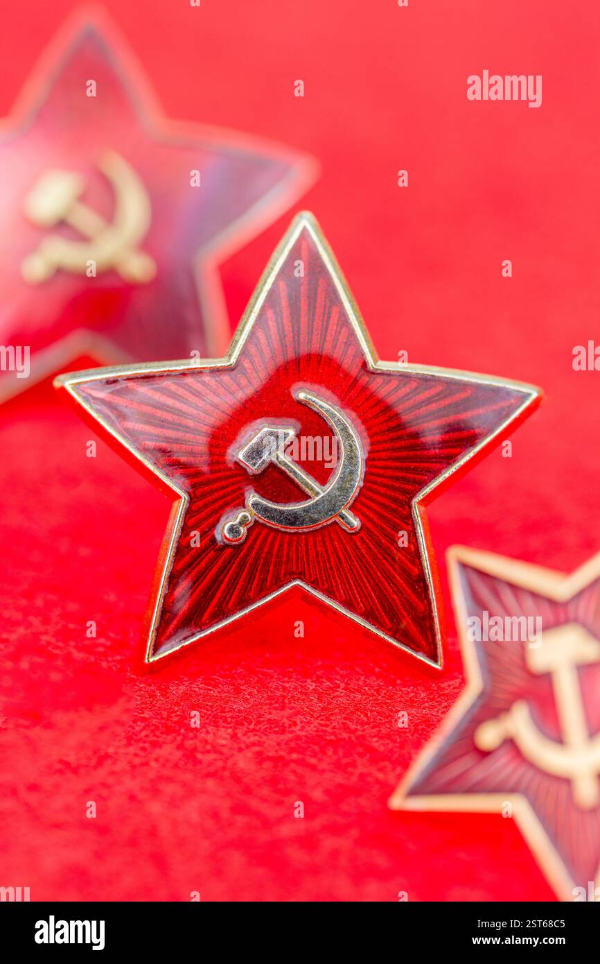 Close shot of Soviet Hammer and Sickle cap badge / Soviet army insignia ...