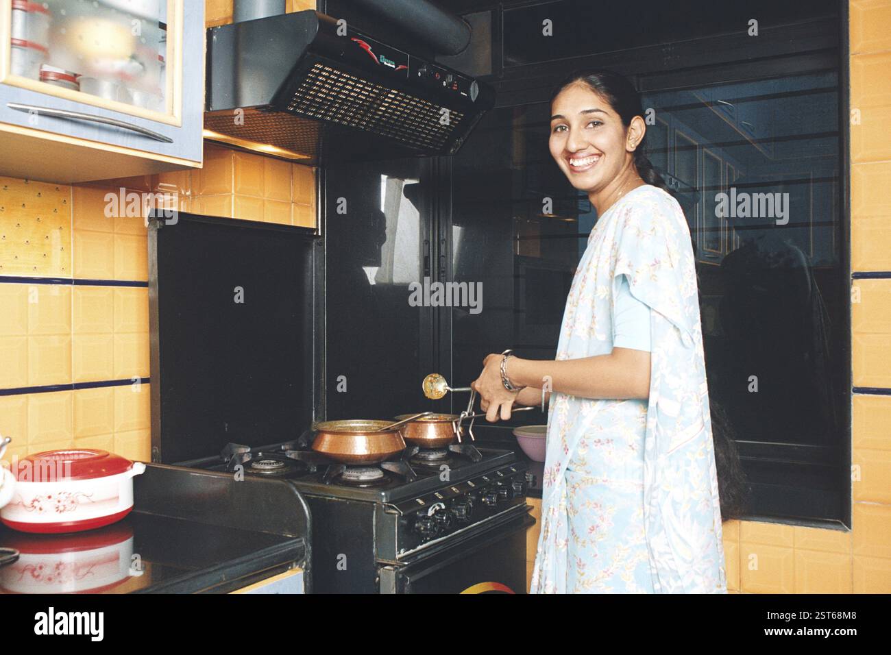 Satisfied young indian woman hi-res stock photography and images - Alamy