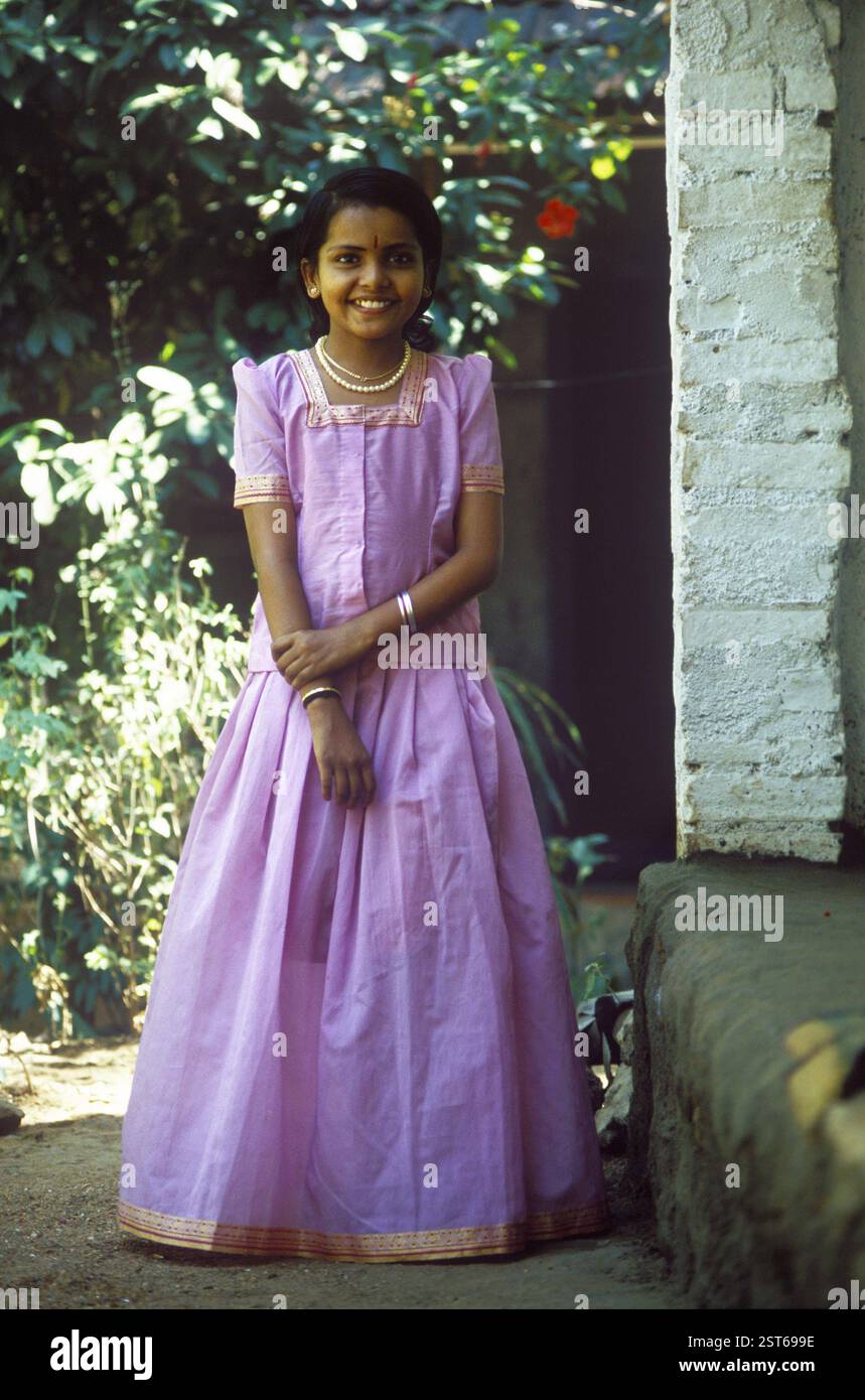 Rural Girl In traditional girls attire in front of her Home, Pala ...