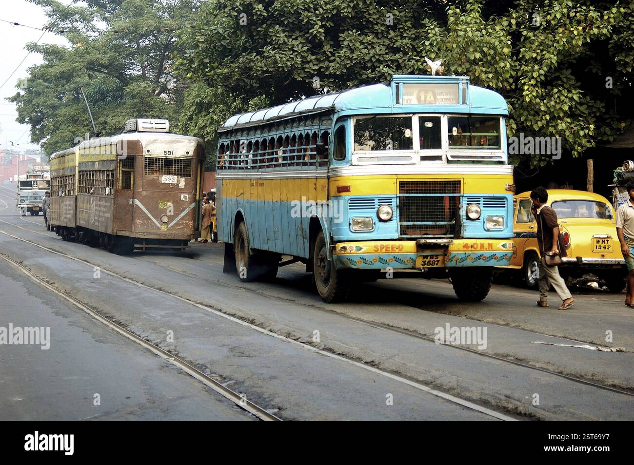 Public transport of tram and bus on roads of Calcutta, West Bengal ...