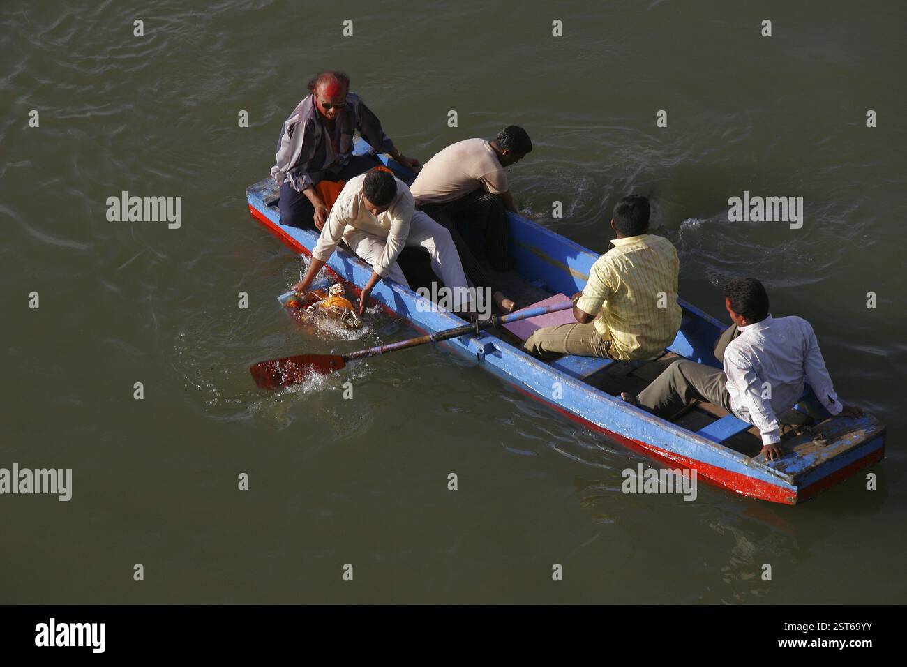 Festival The immersion of idols of Lord Ganesh ganpati, the elephant headed God, in the Mula ...