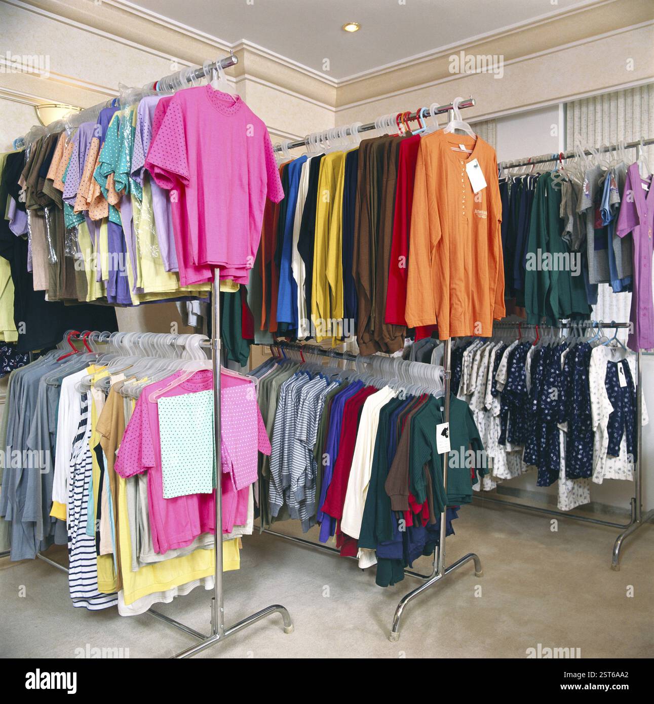 Readymade garment arrange in shop Stock Photo - Alamy