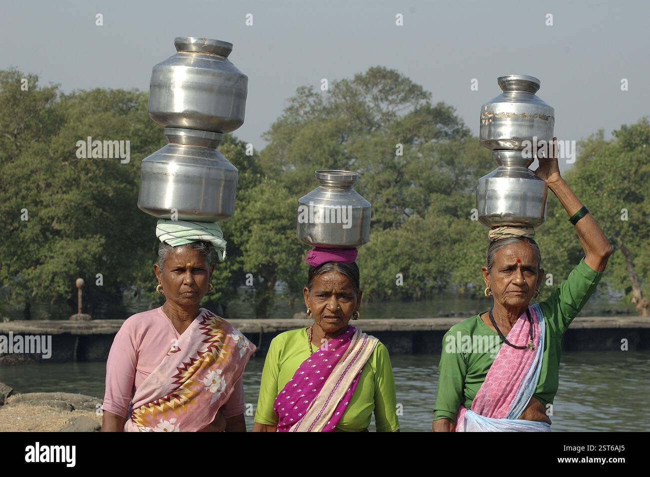 Three Adivasi Woman balancing water pots on their heads, Bombay mumbai ...