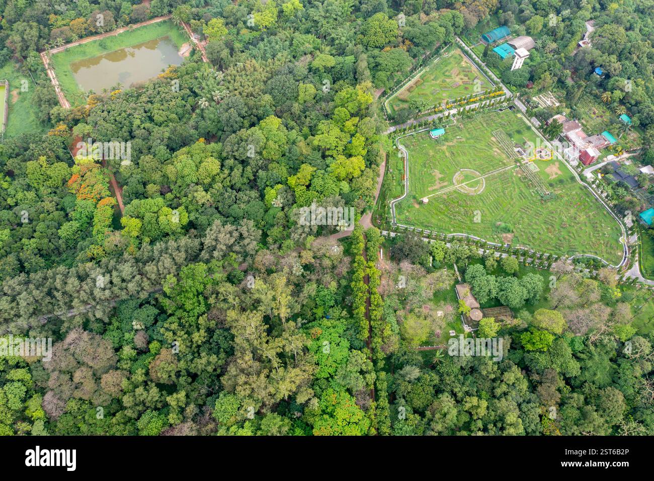 A stunning aerial view of the National Botanical Garden, showcasing lush greenery and serene ...