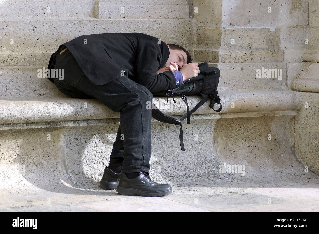 Unusual sleeping posture hi-res stock photography and images - Alamy