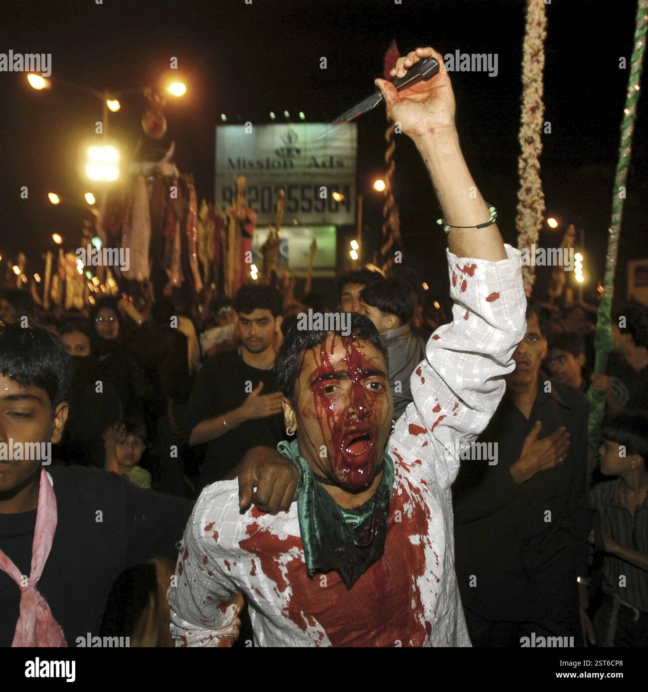 A Shia muslim doing 'kama ka mataam' during Moharrum in remembrance of ...