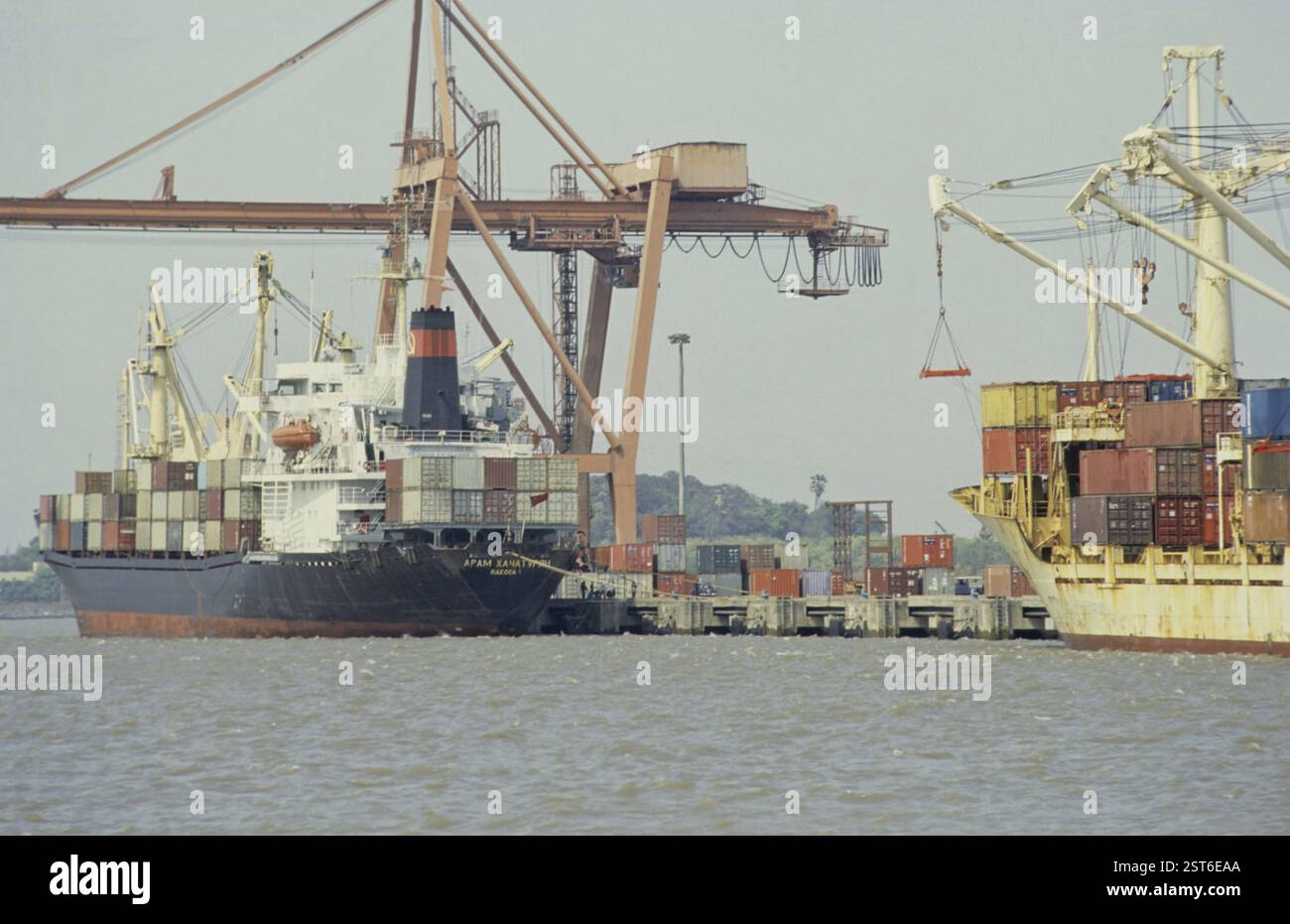 Shipping, Containers loading at Port, Nava Seva Stock Photo - Alamy