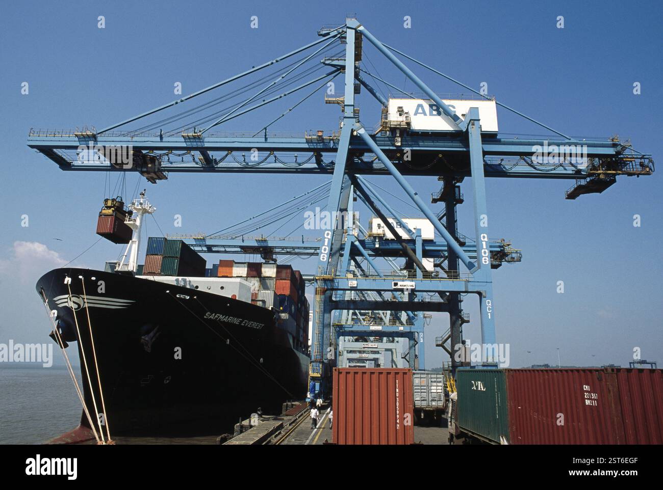 Containers loading at port, nava seva, india Stock Photo - Alamy