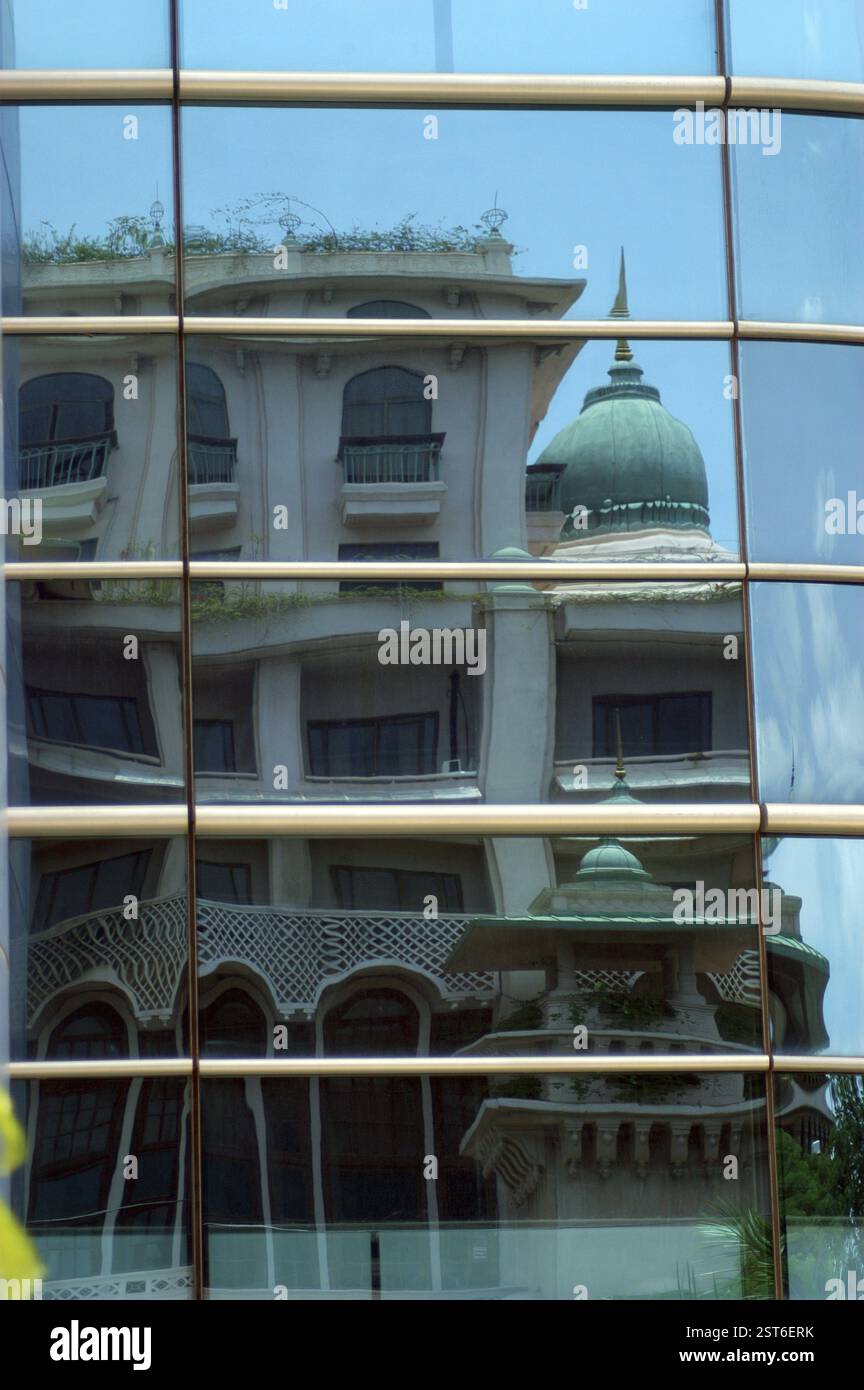Reflection of a building on RMZ Corp, RMZ Titanium building a modern ...