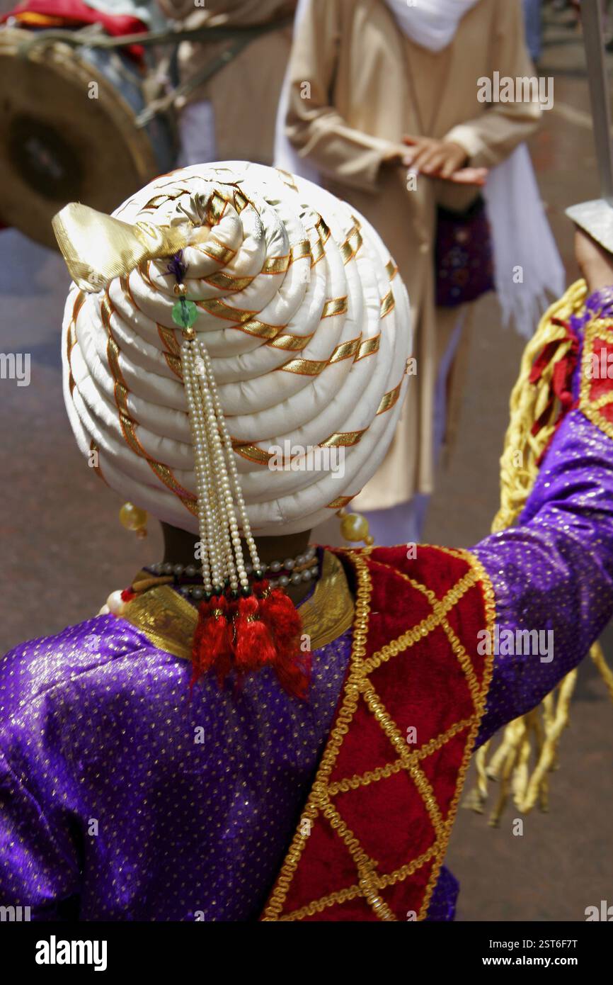 An Indian child wearing a head gear similar to the one worn by Shivaji ...