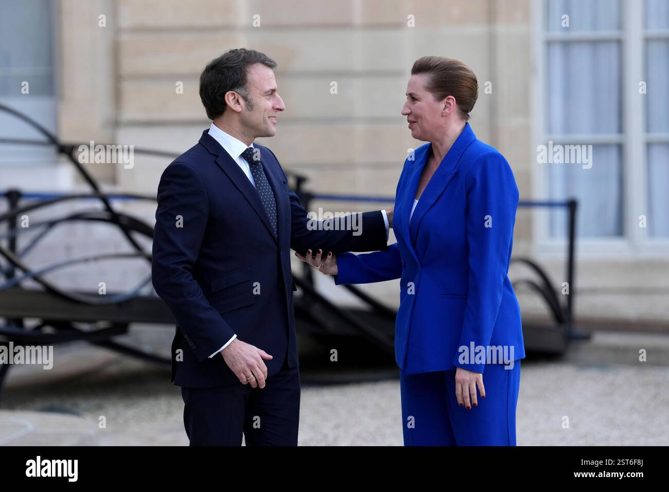 French President Emmanuel Macron, left, greets Denmark's Prime Minister ...