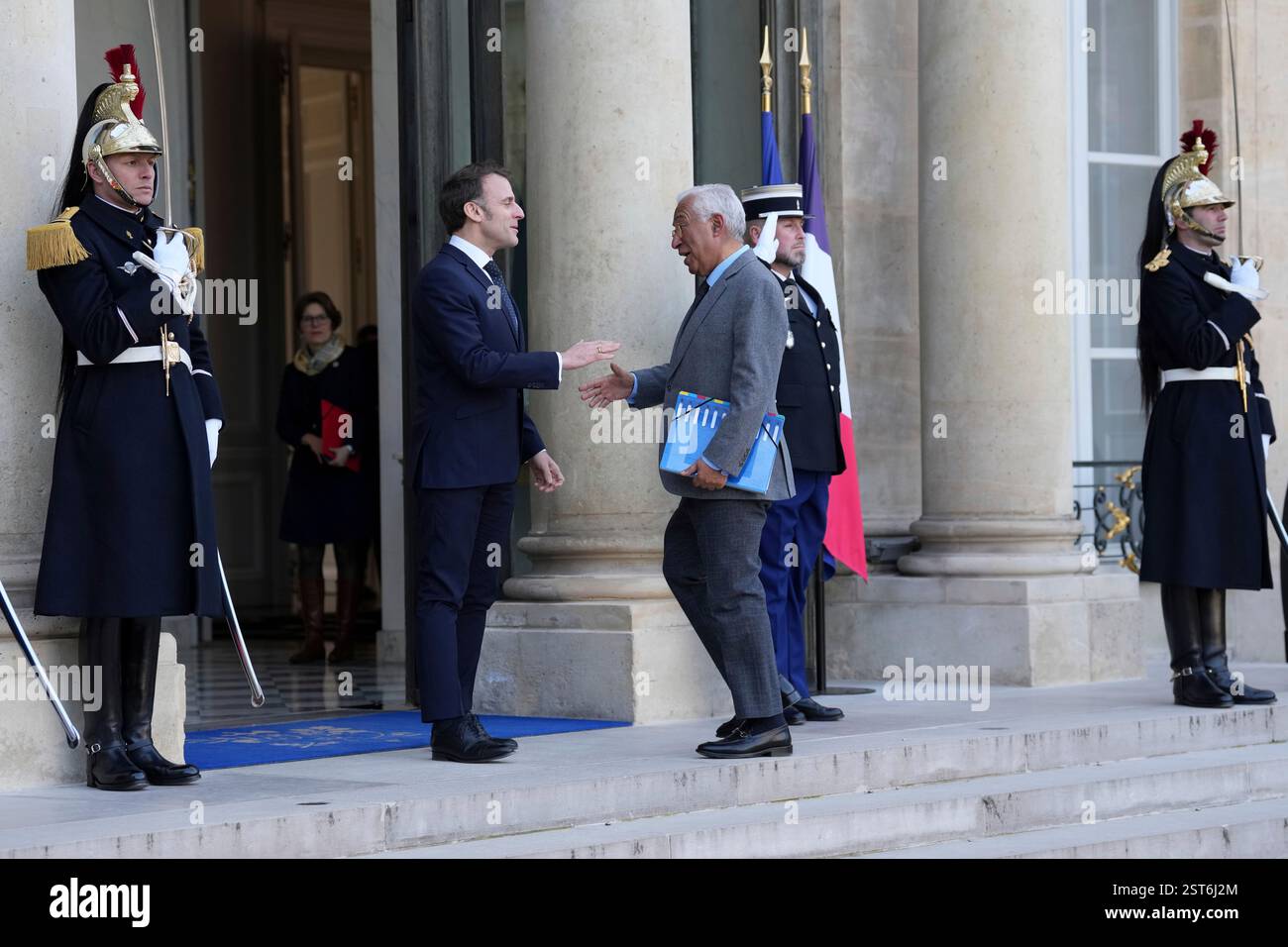 French President Emmanuel Macron, left, greets European Council ...