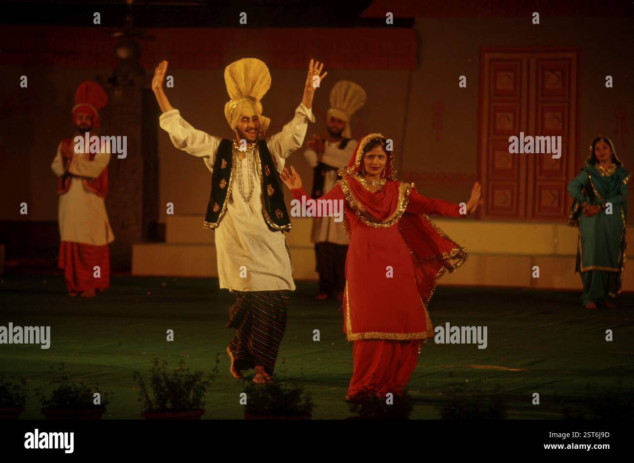 Folk dance, Man and Woman performing Bhangra dance, punjab, india NO MR ...