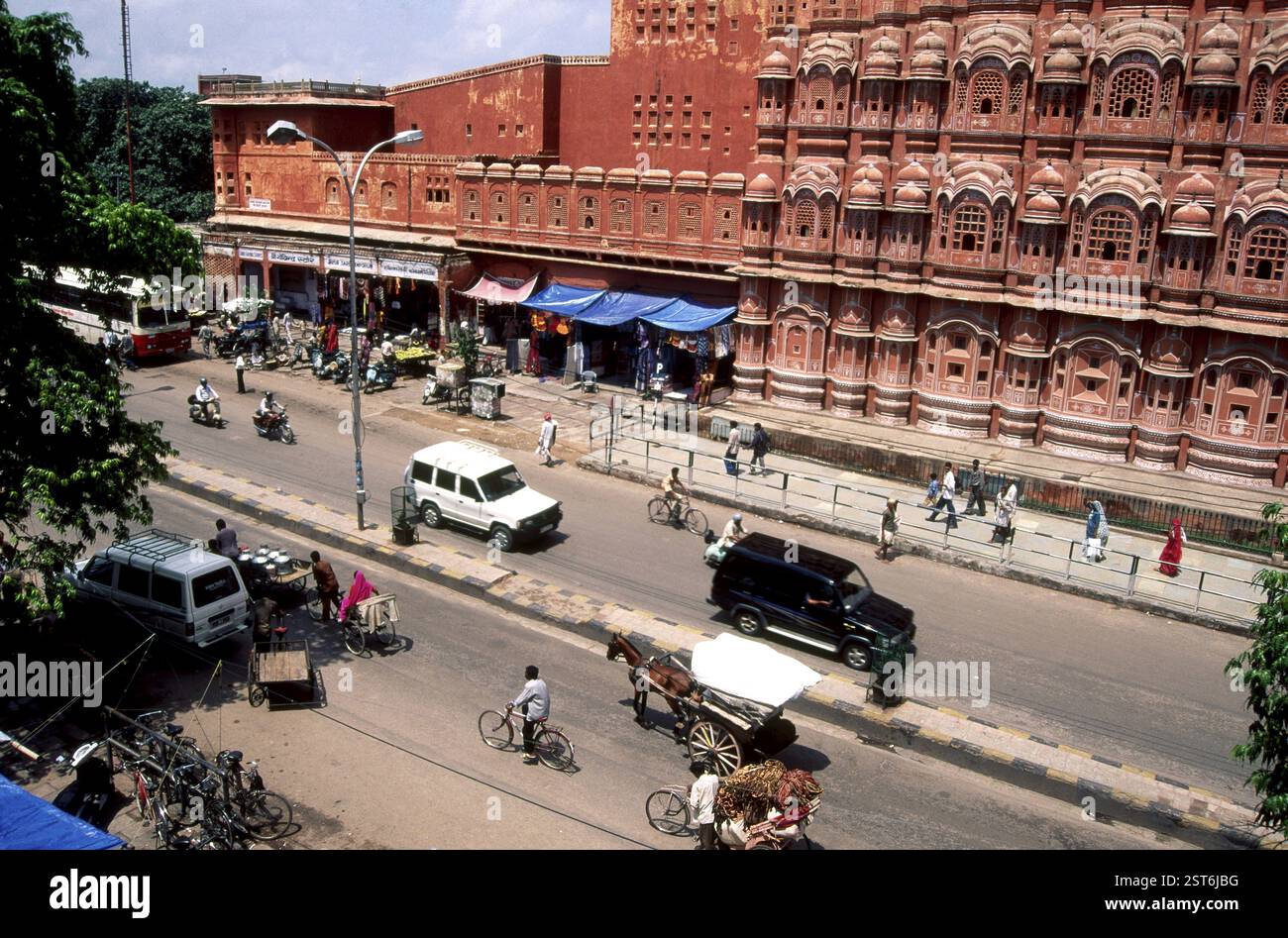Means of transport on street at Hawa Mahal Palace of wind, Jaipur ...