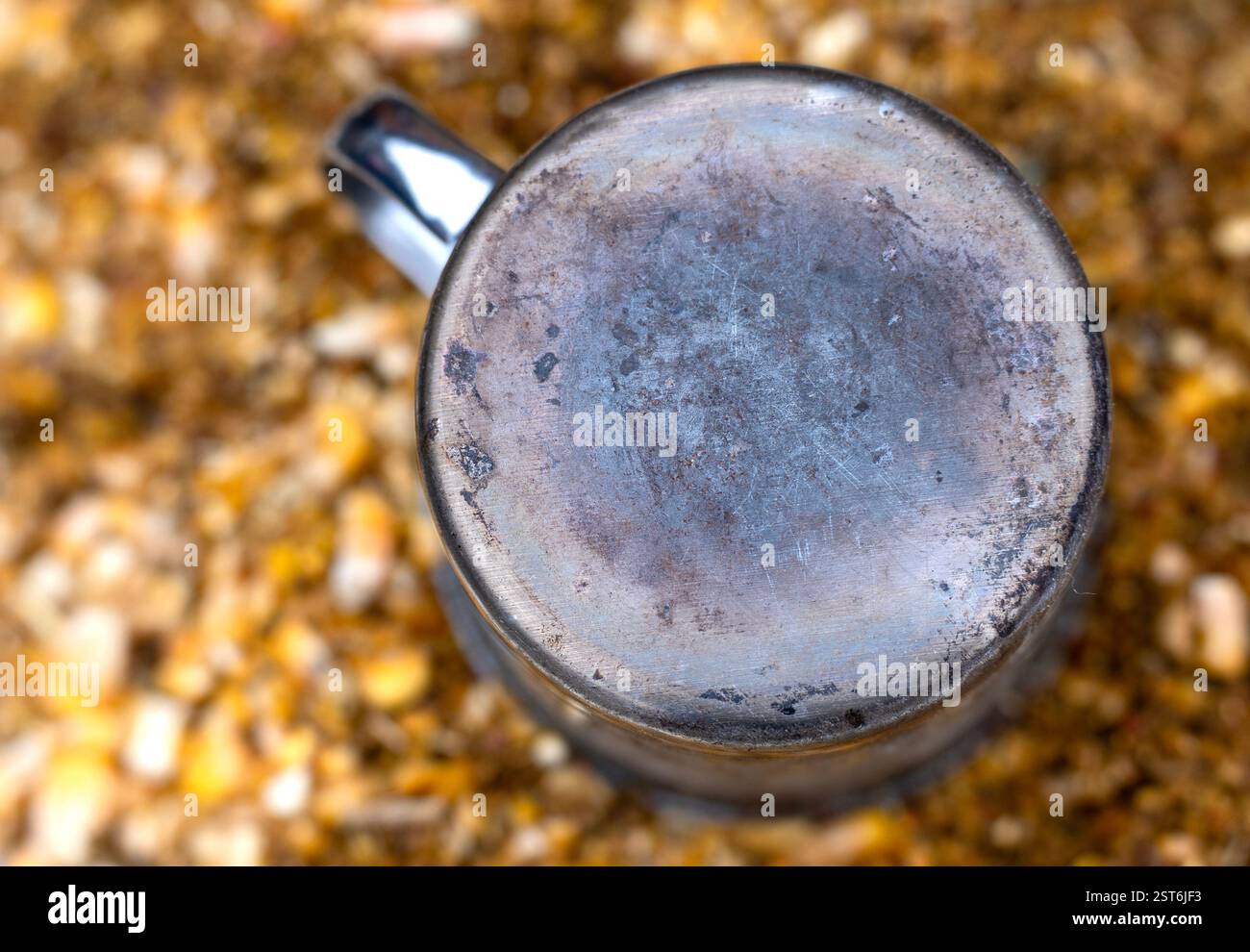Aged Iron Cup: A Rustic Still Life Stock Photo - Alamy