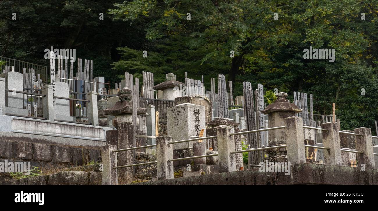Traditional Japanese cemetery on the side of a mountain in Kyoto Japan ...