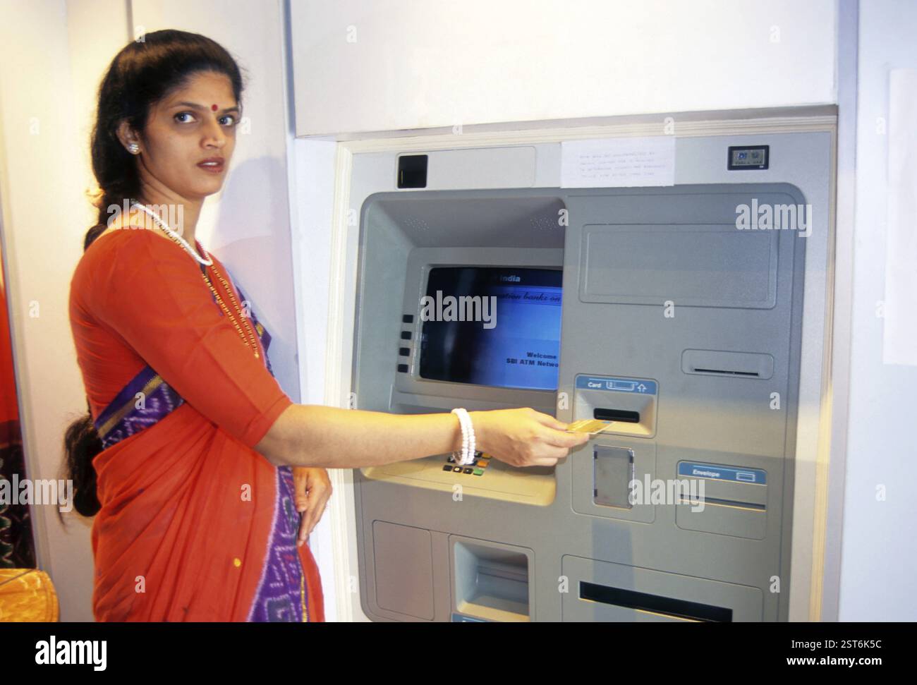 Money women tech hi-res stock photography and images - Alamy