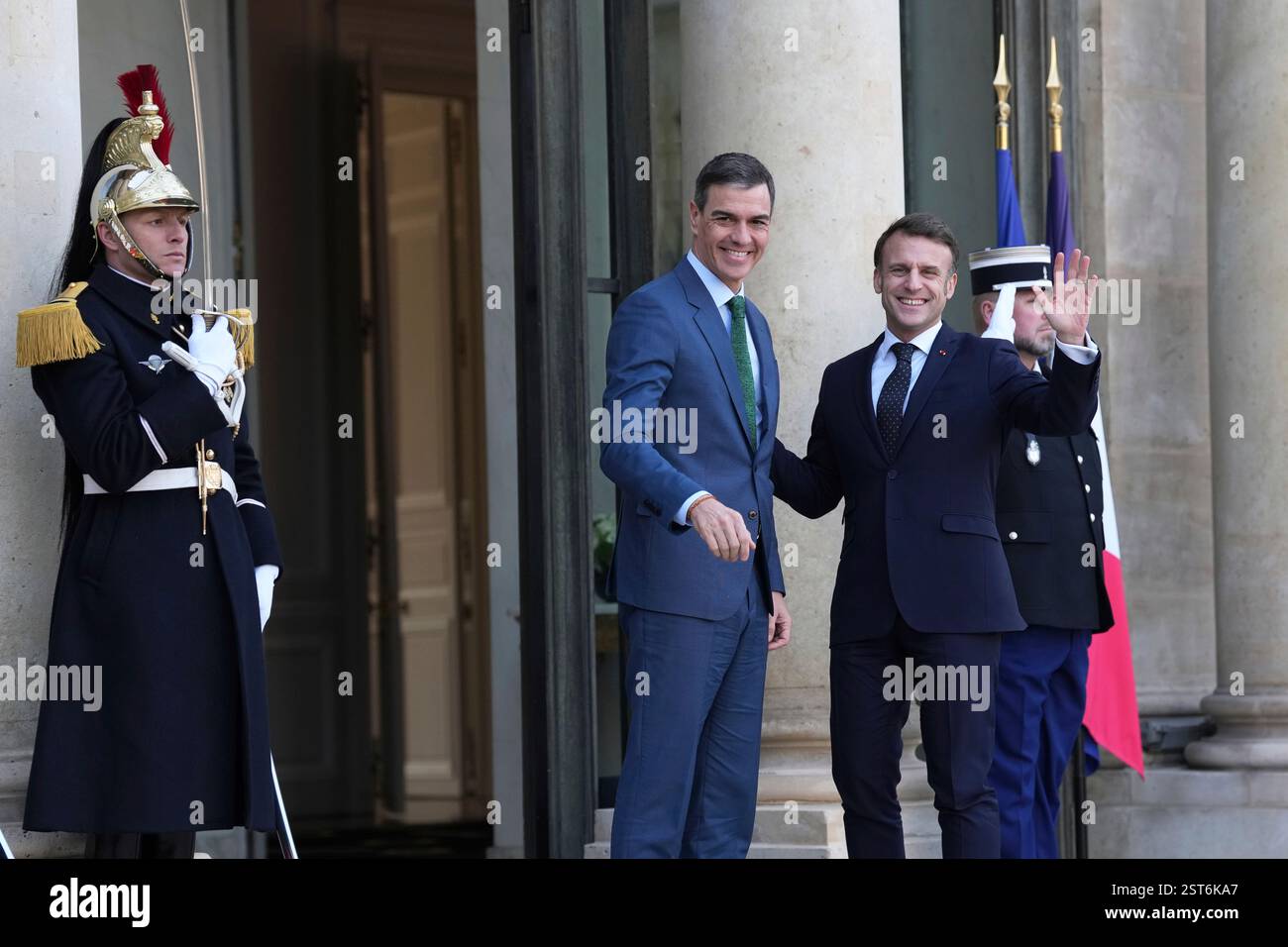 French President Emmanuel Macron, right, greets Spain's Prime Minister ...