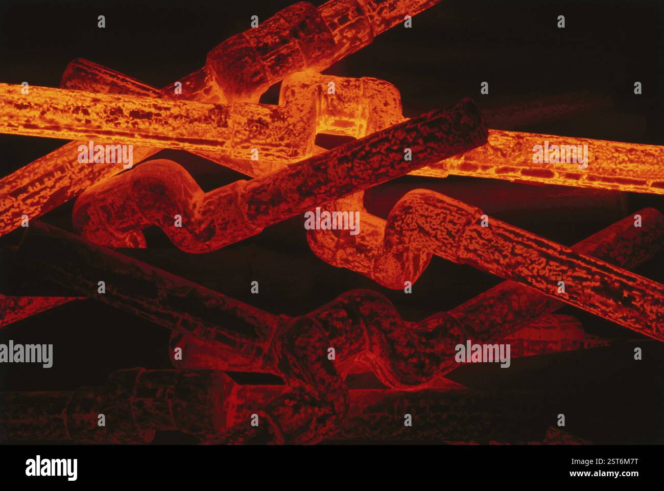 Hot steel rods, steel industry, india Stock Photo - Alamy
