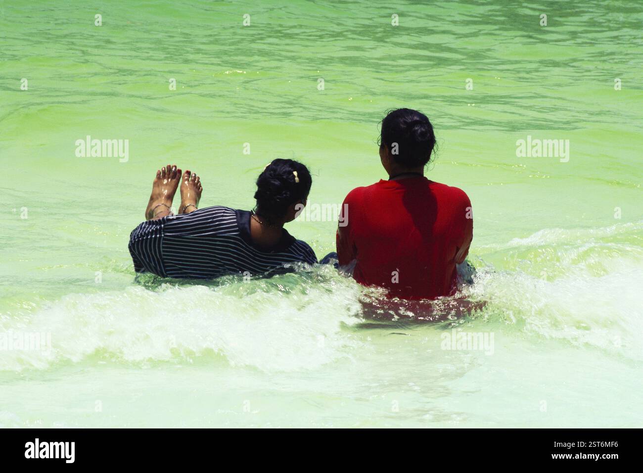 Ladies sitting in wave of swimming pool, Lonavala, Maharashtra, India ...