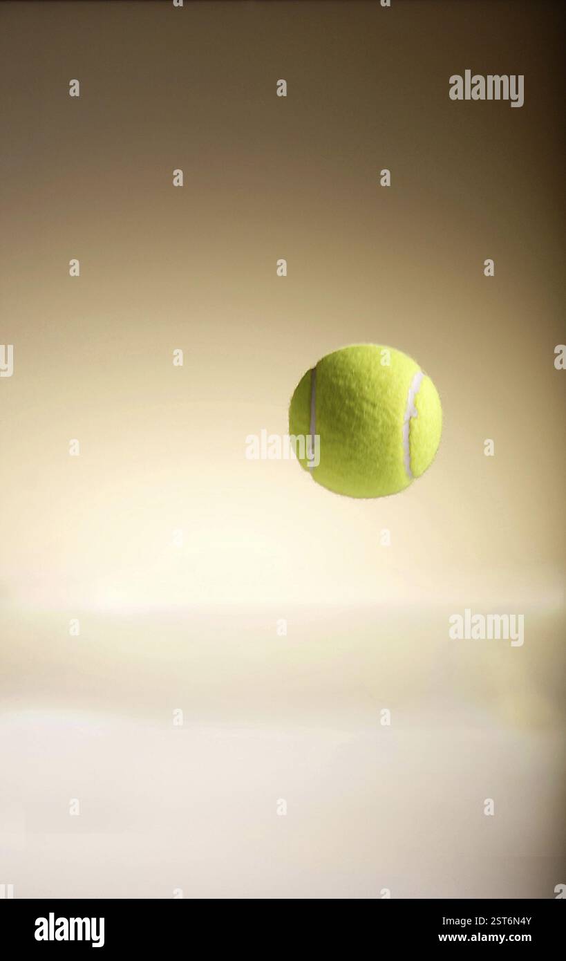 One green color tennis balls bouncing in air Stock Photo - Alamy