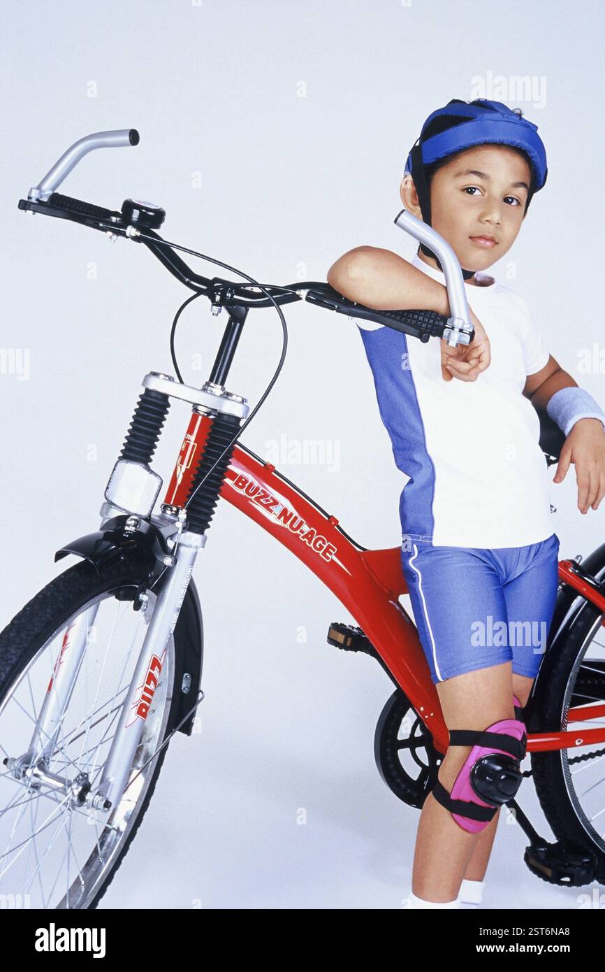 Boy with cycle Stock Photo - Alamy