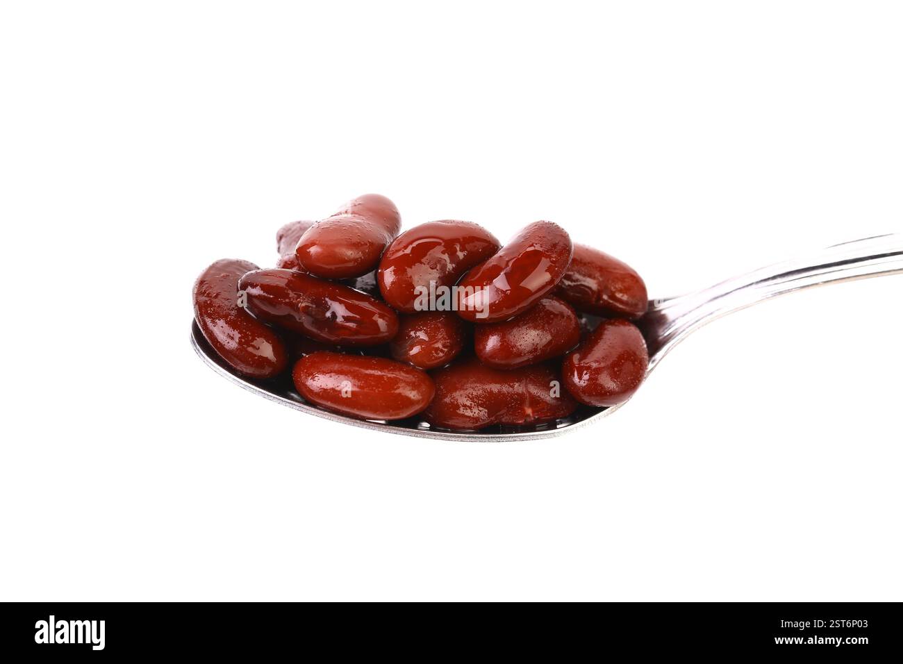 Preserve beans on a spoon. White background Stock Photo - Alamy