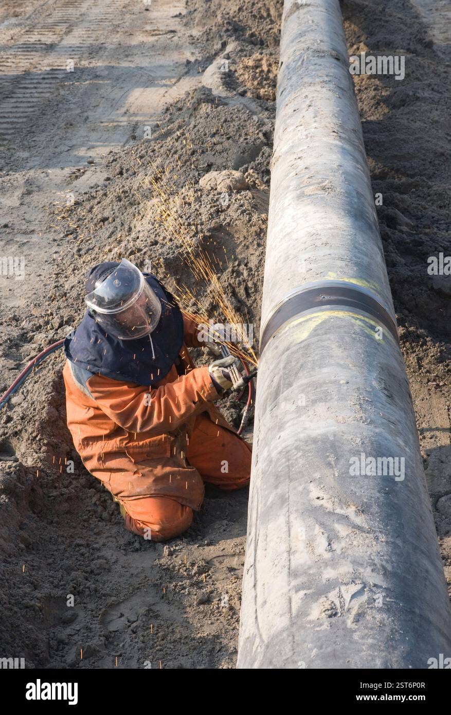 Asbestos removal and disposal of a pipeline. Remediation pipeline. Cutting a pipeline Stock ...
