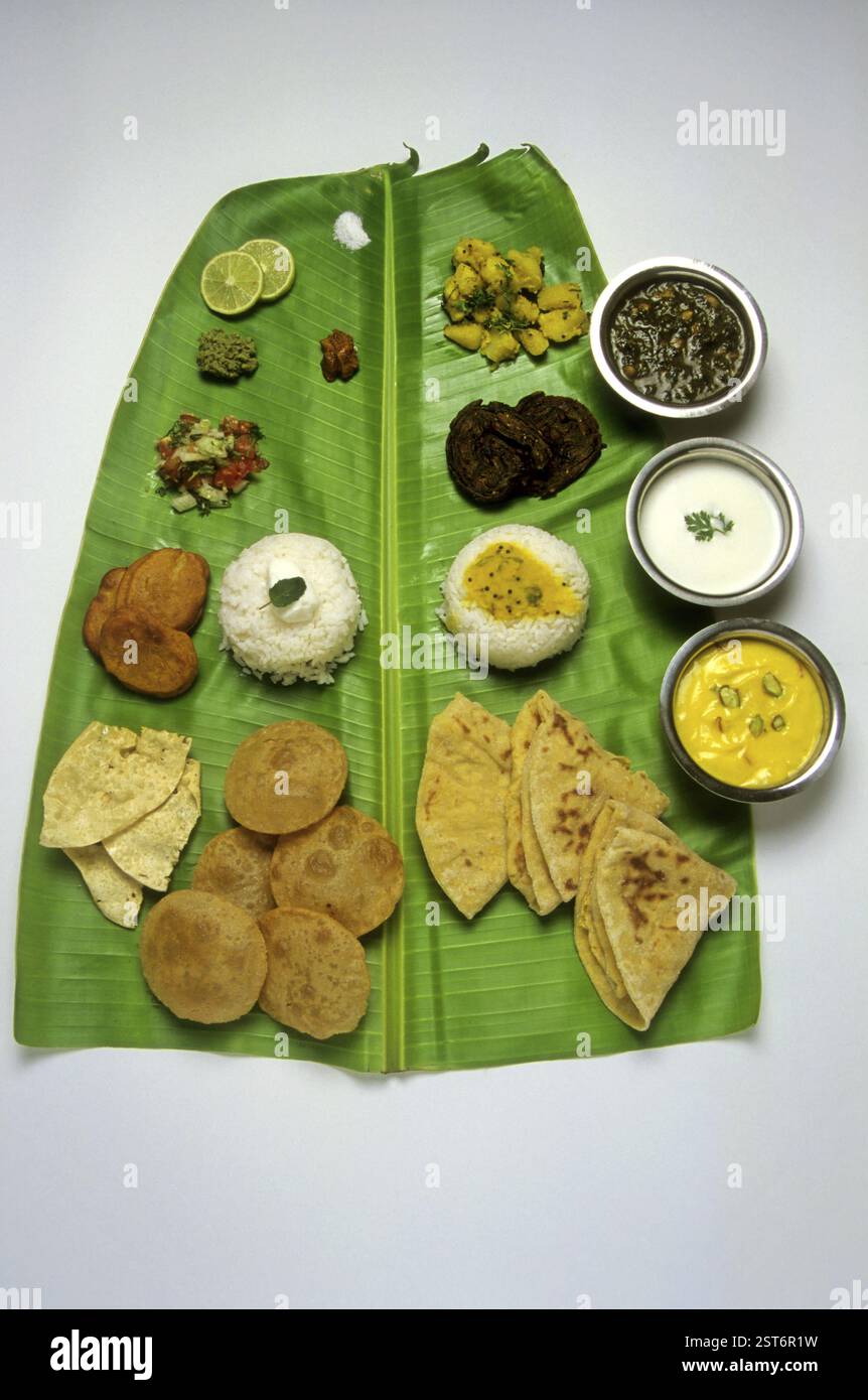 Maharashtrian food on banana leaf, india Stock Photo - Alamy