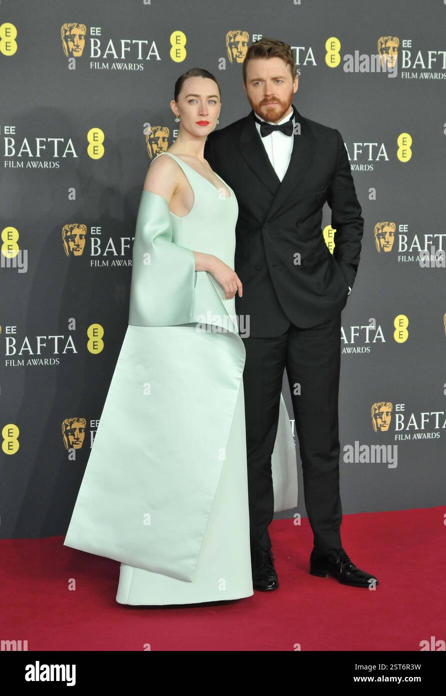 Saoirse Ronan and Jack Lowden at the 78th EE BAFTAs British Academy ...