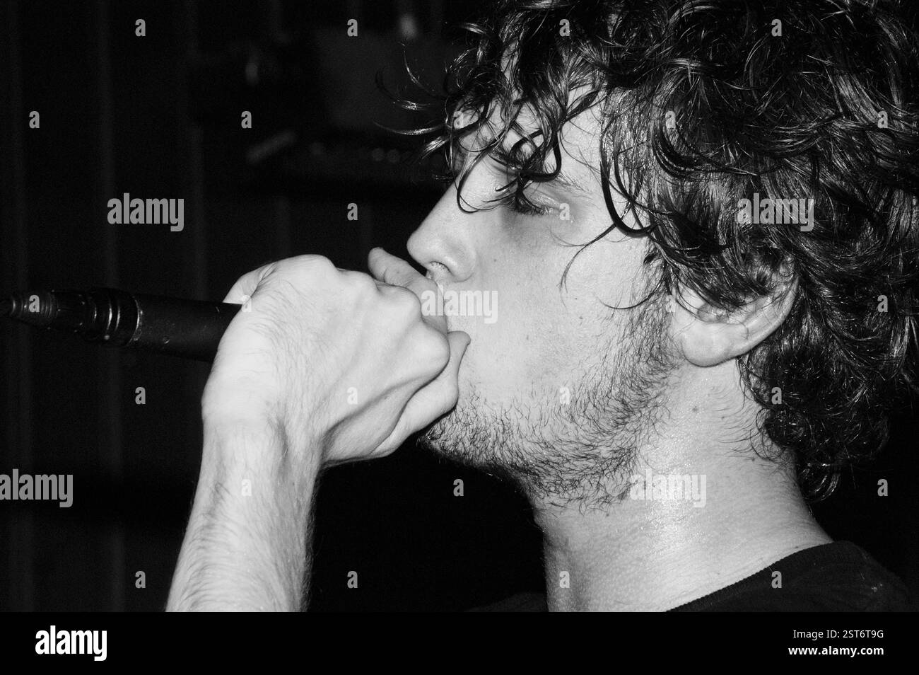 Singer Nick Atkinson from the pop band ROOSTER playing a sweaty early ...