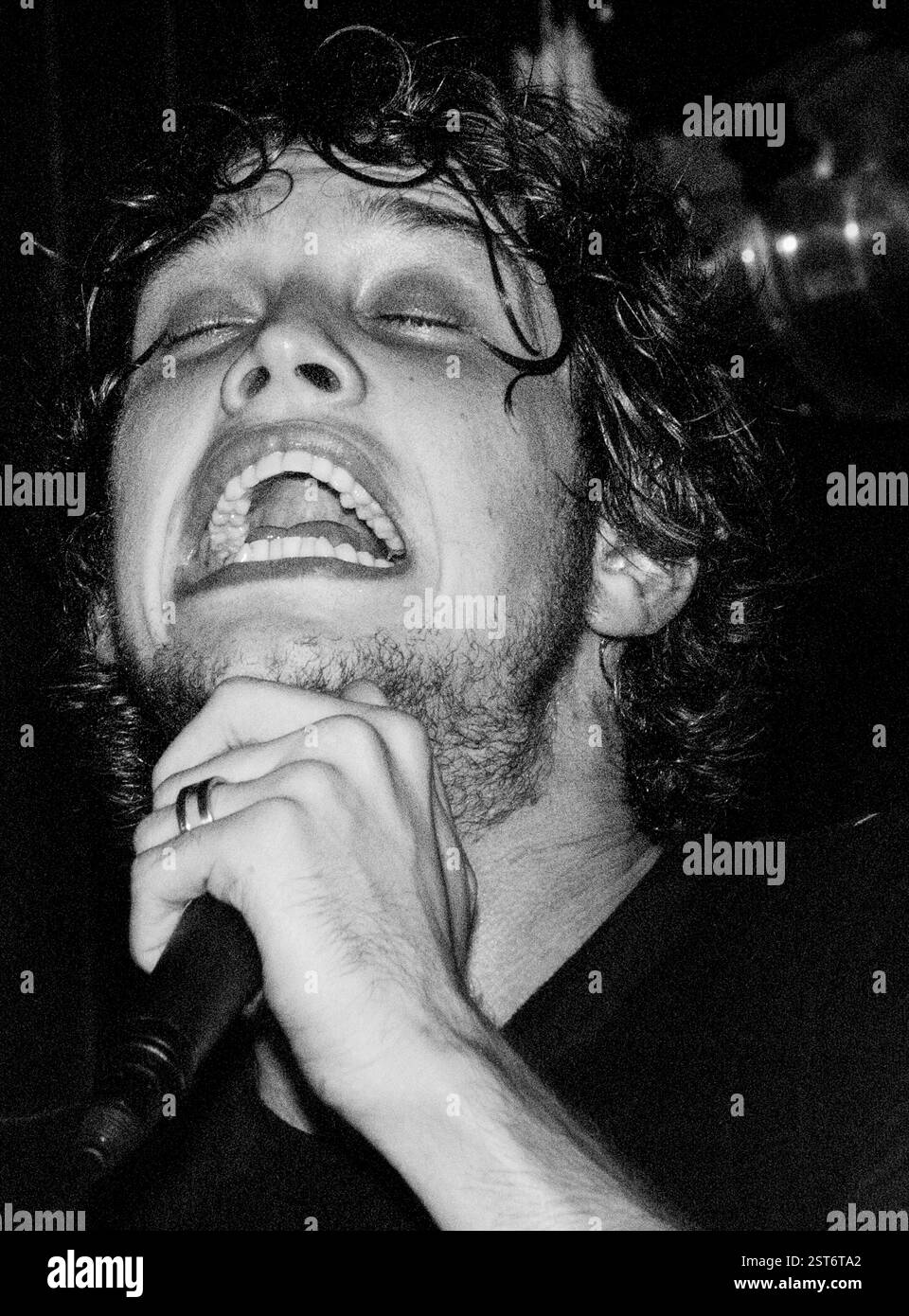 Singer Nick Atkinson from the pop band ROOSTER playing a sweaty early ...