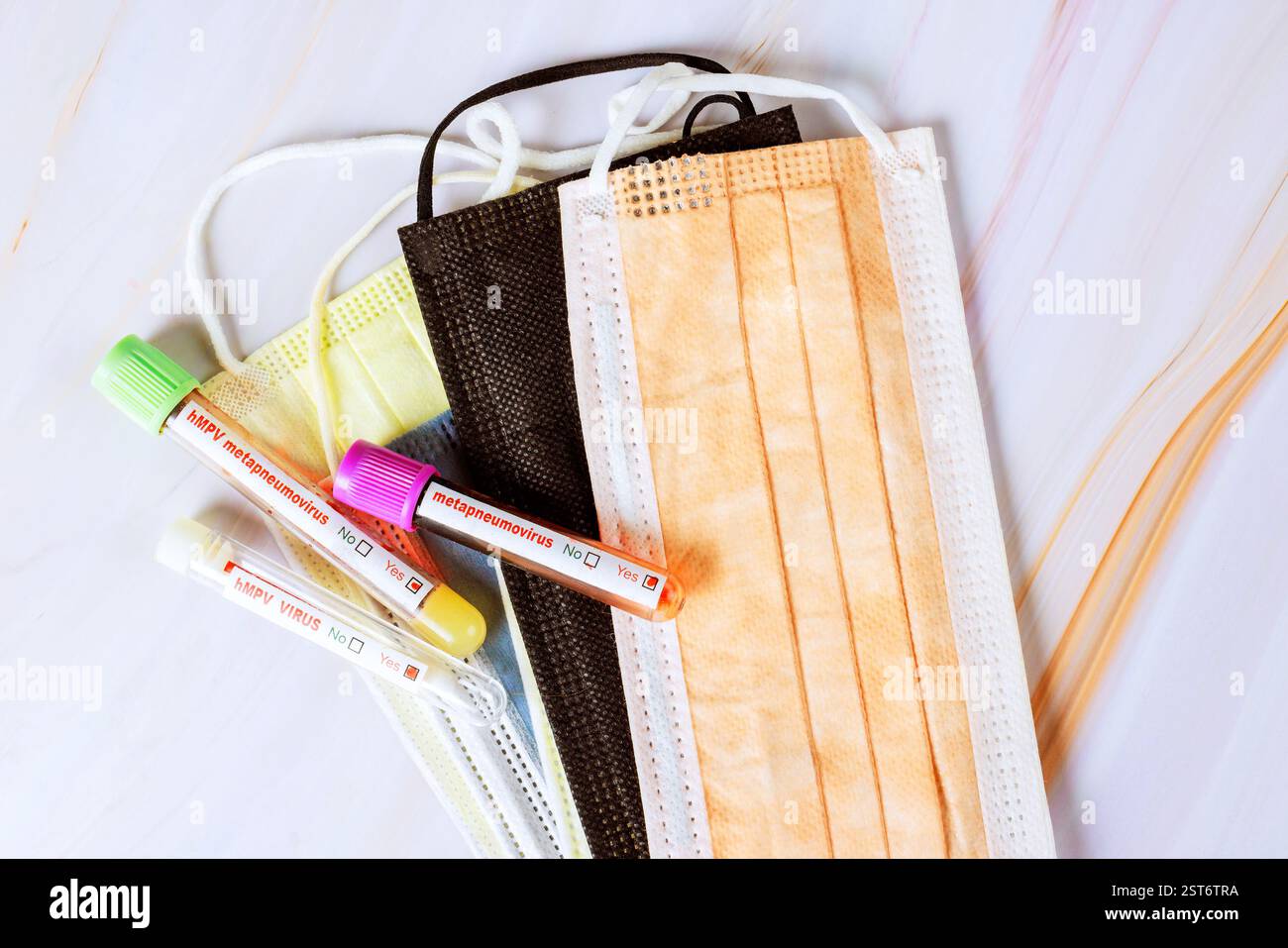 Various medical face masks blood test tubes vials are health ...