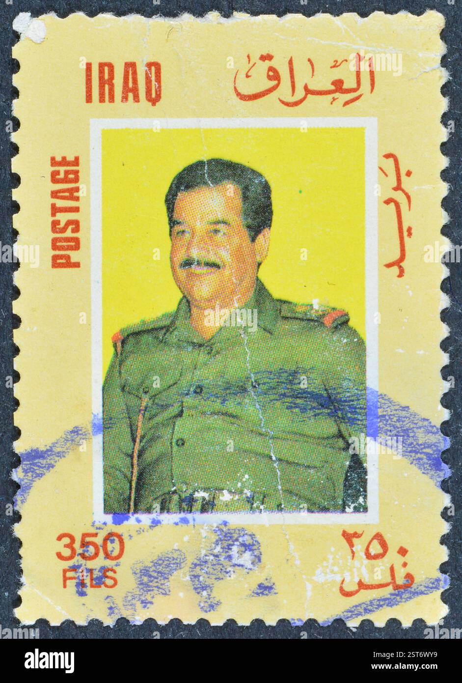 Cancelled postage stamp printed by Iraq, that shows President Saddam ...