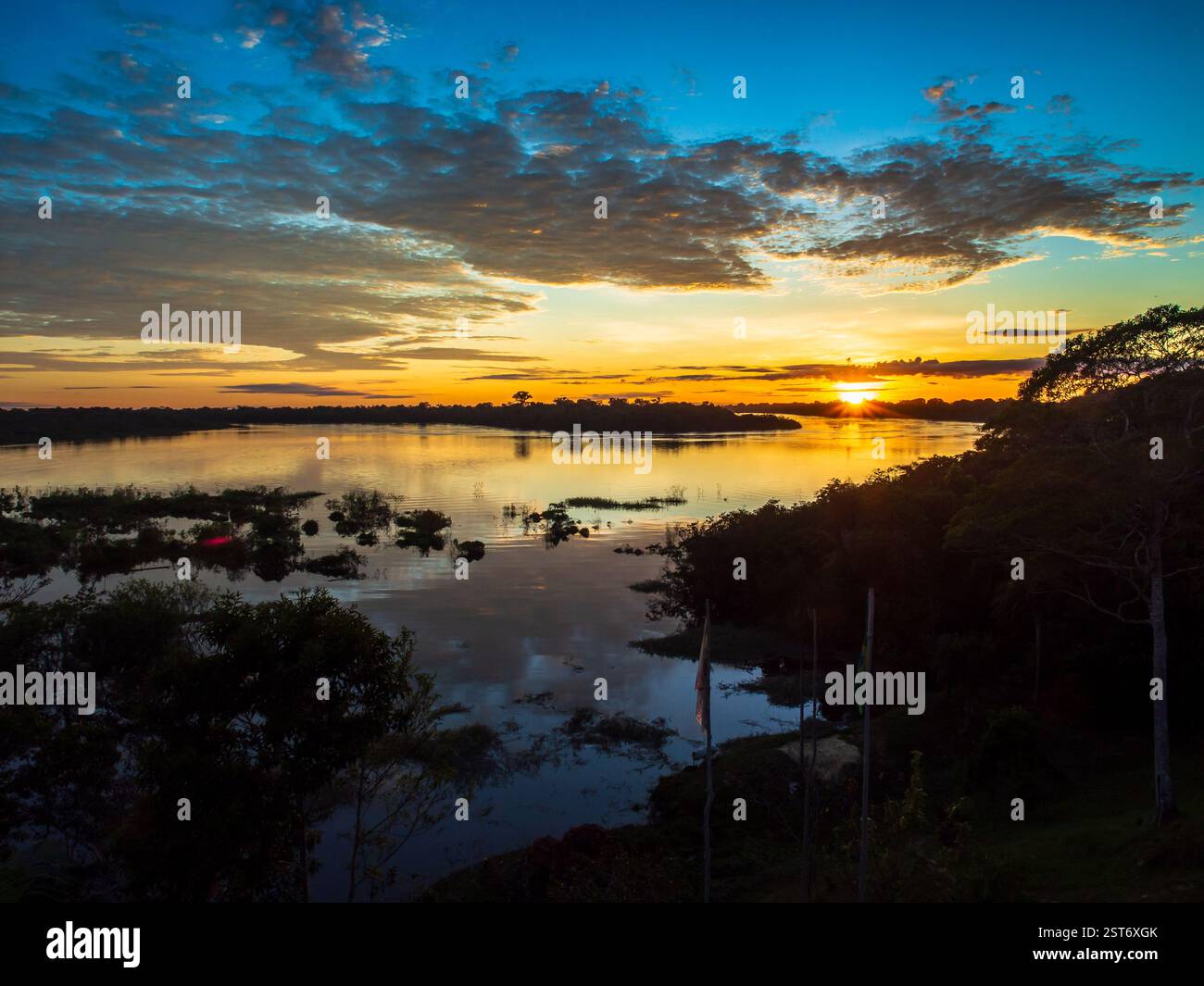 Amazonia - sunset over the Javari river, Amazonas rain forest. Selva on ...