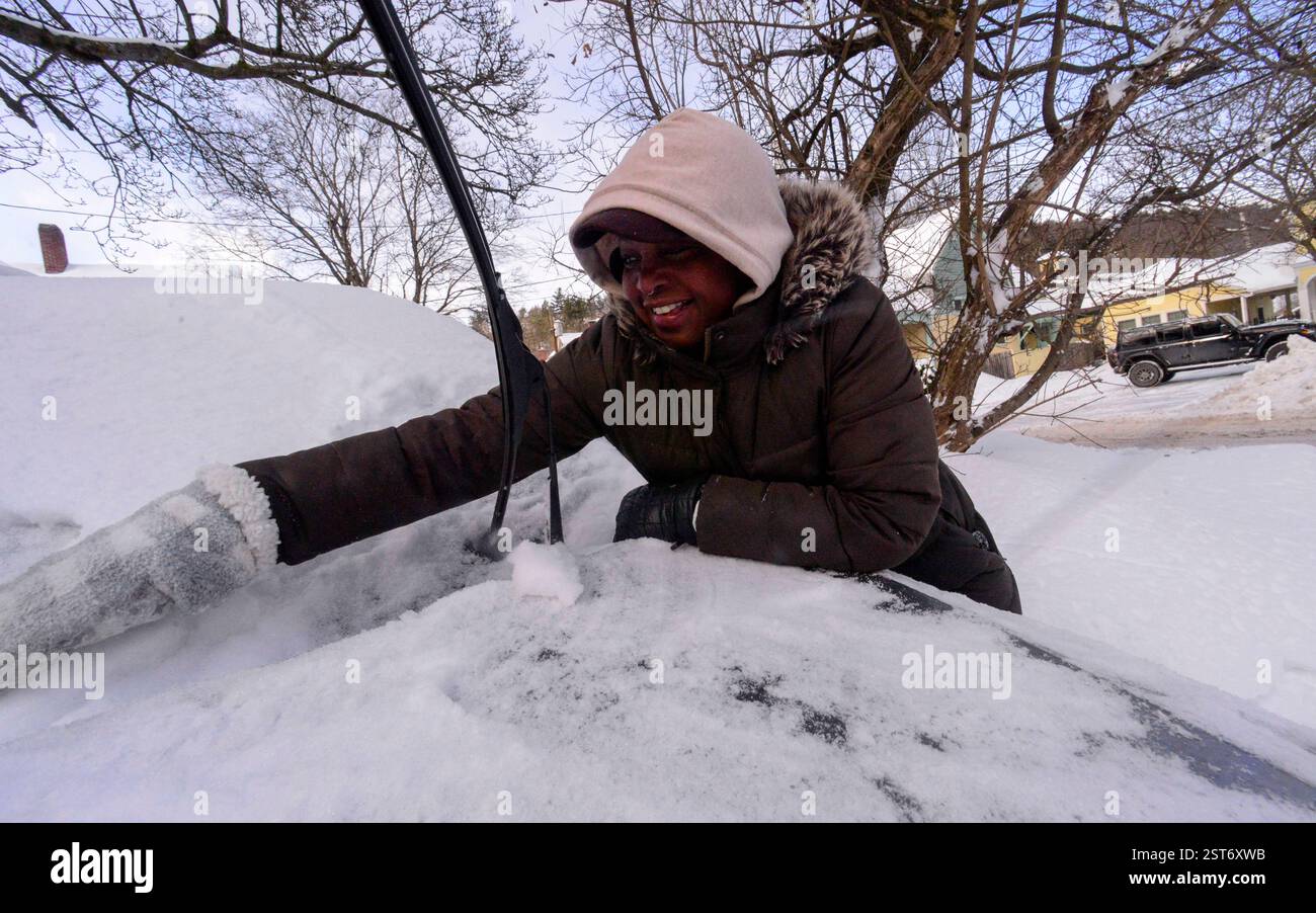 Bryana Worthy uses her hands to help break up some of the ice chunks on ...
