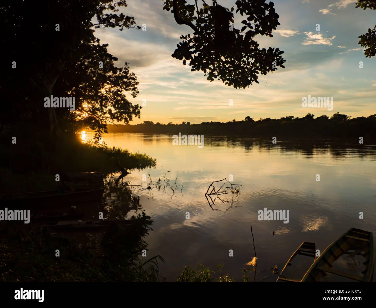 Amazonia - sunset over the Javari river, Amazonas rain forest. Selva on ...