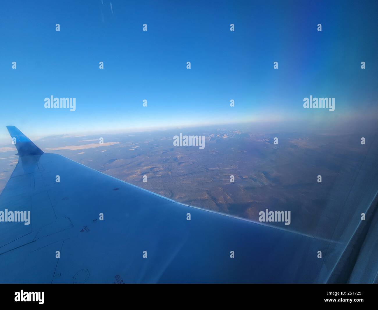 Mountain landscape view through plane hi-res stock photography and ...