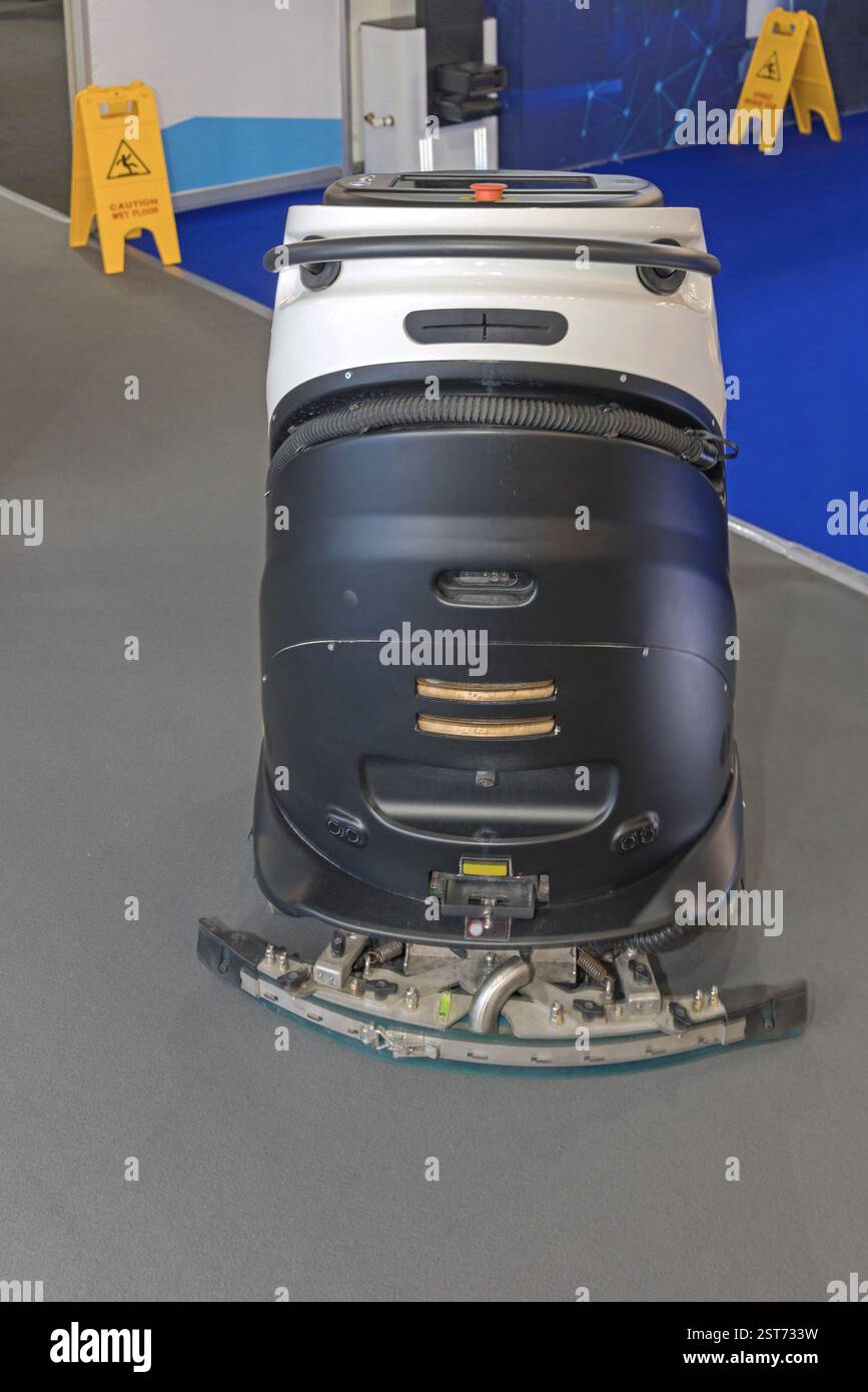 Autonomous Cleaning Robot Cleaning Floor at Hall Corridor Stock Photo ...