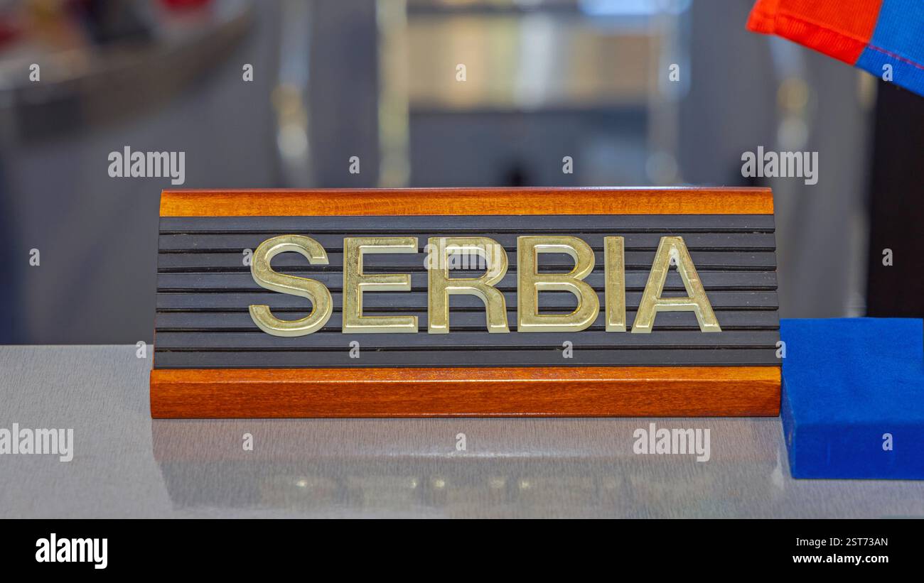 3d Golden Sign Serbia in Holder at Conference Table Stock Photo - Alamy