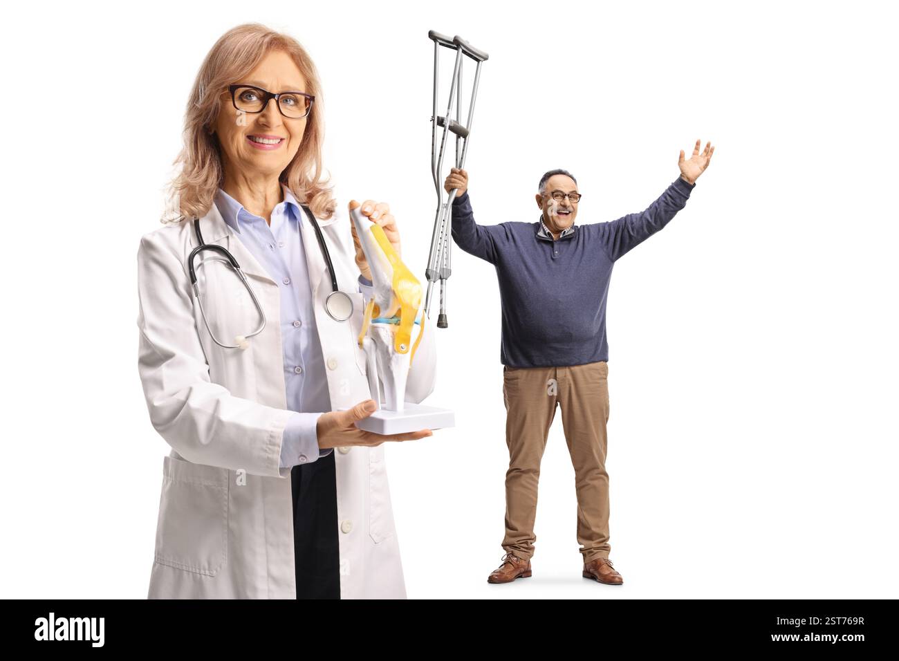 Female doctor and a mature man raising crutches and recovering from ...