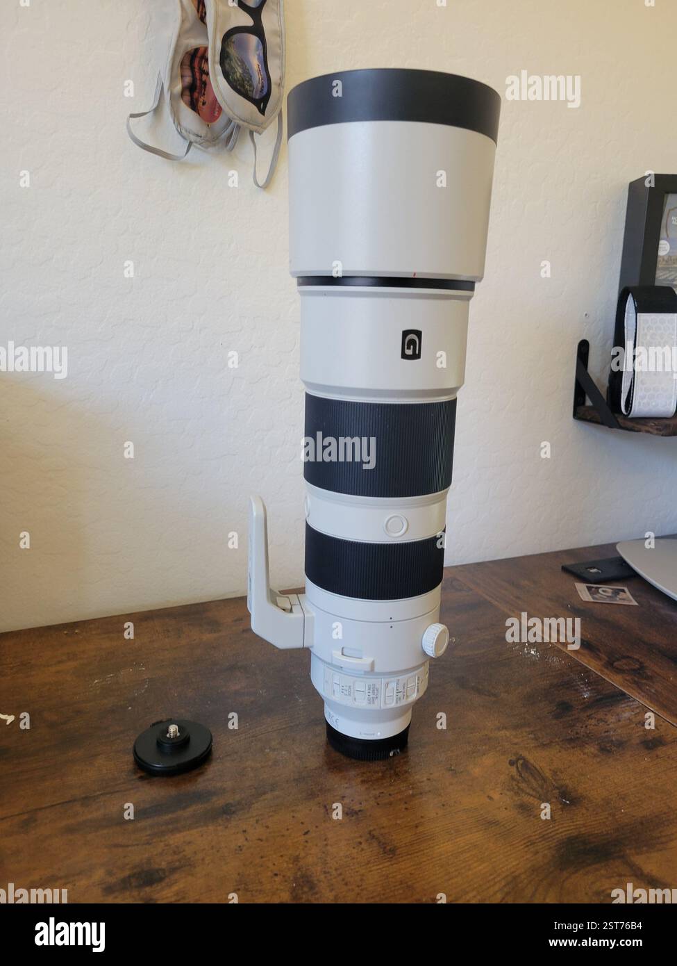This highperformance telephoto lens is crafted for photography ...