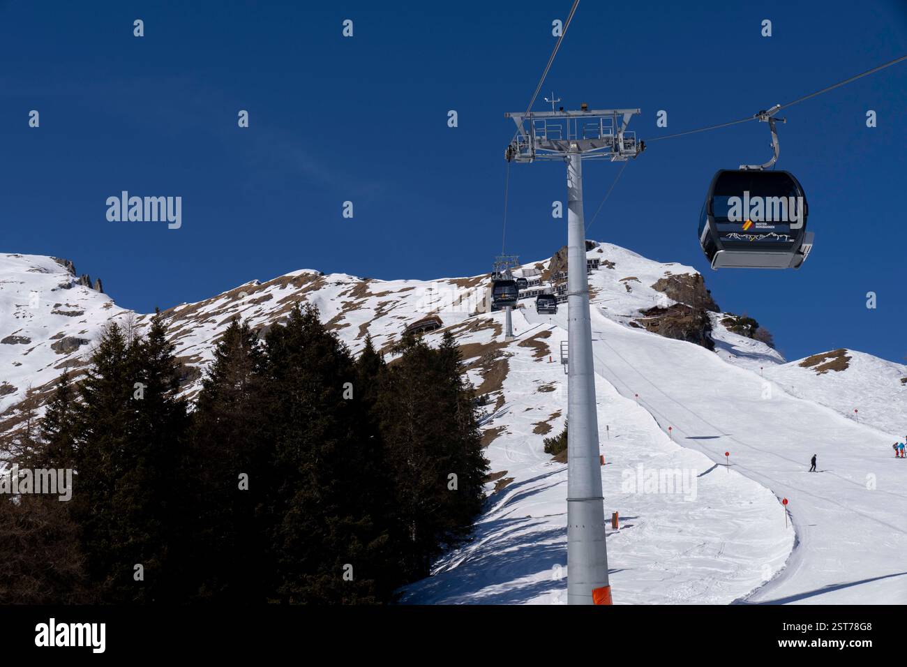 Imst, Tyrol, Austria. 17th Feb, 2025. Sunny view from a gondola towards ...