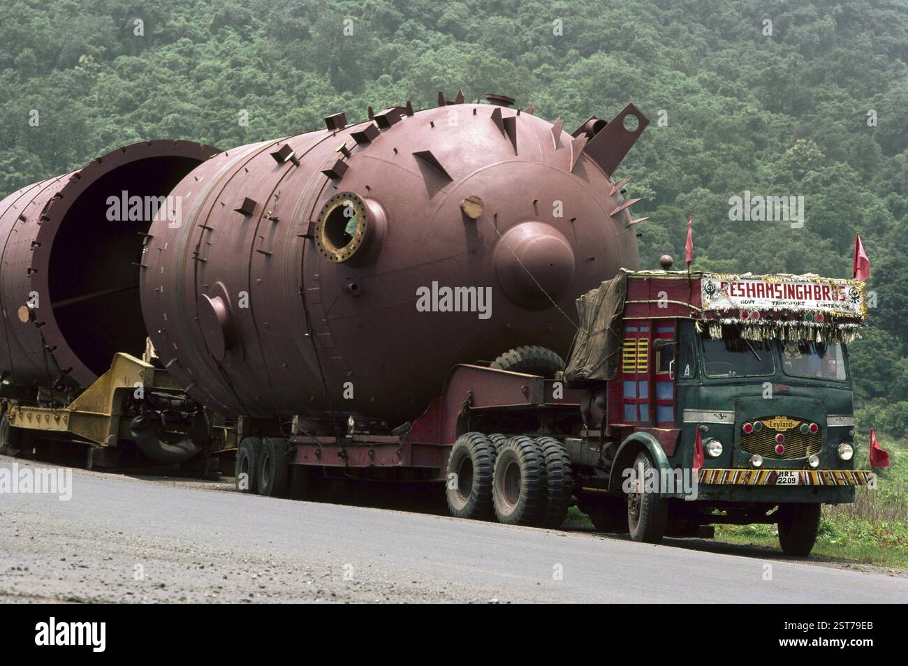 Truck carrying boiler, india Stock Photo - Alamy