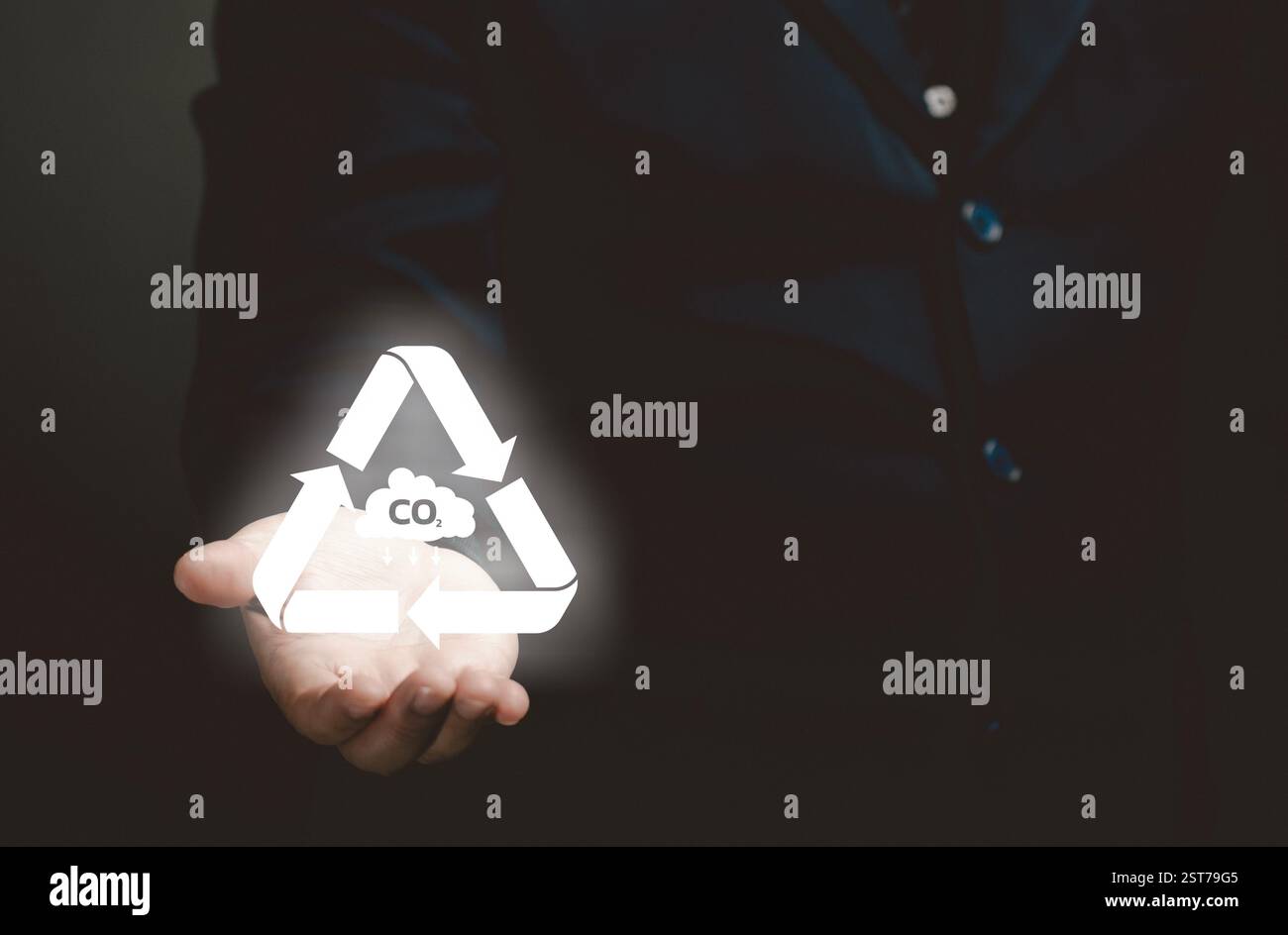 man hold the co2 icon in hand. air pollution concept.responsibility and ...