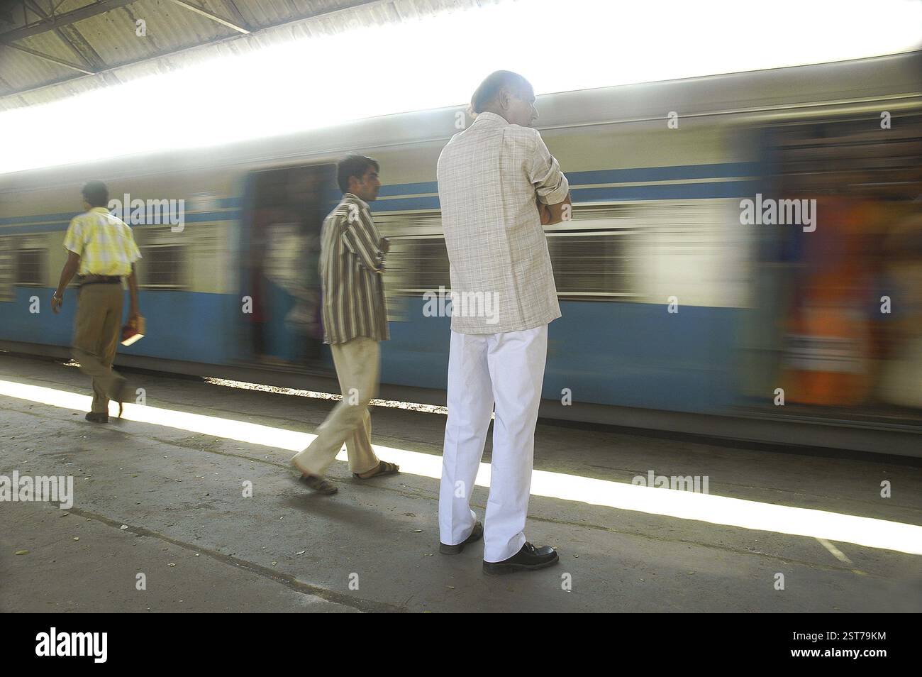 Trains Railways, Indian man waiting on platform for local train, Bombay ...