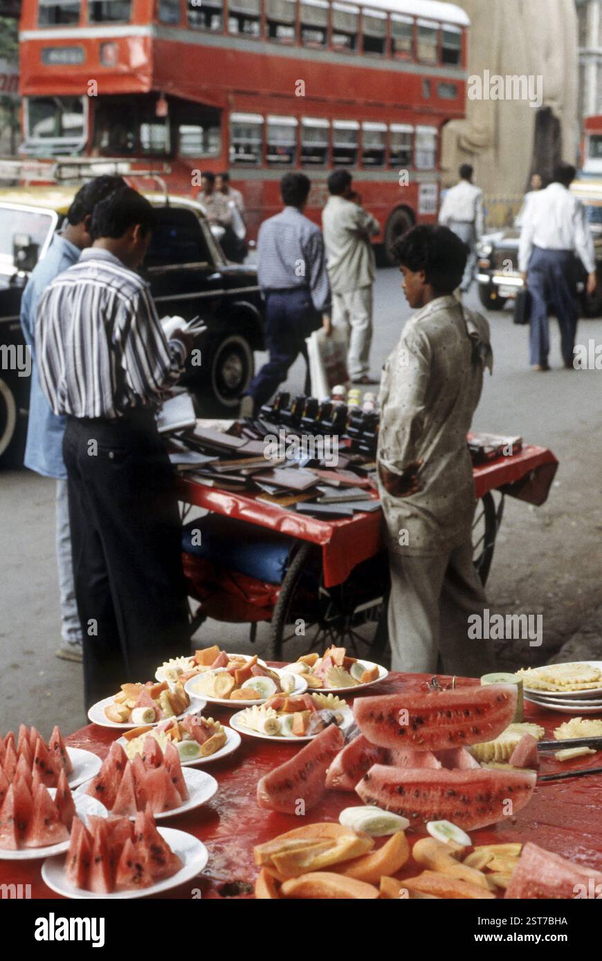 Fruits slices sold on the roadside fruit stall, mumbai bombay ...