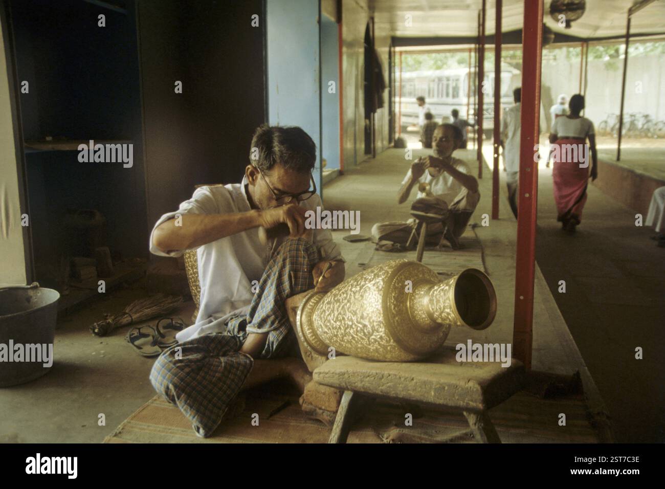 Craftsmen working in small scale factory, india Stock Photo - Alamy